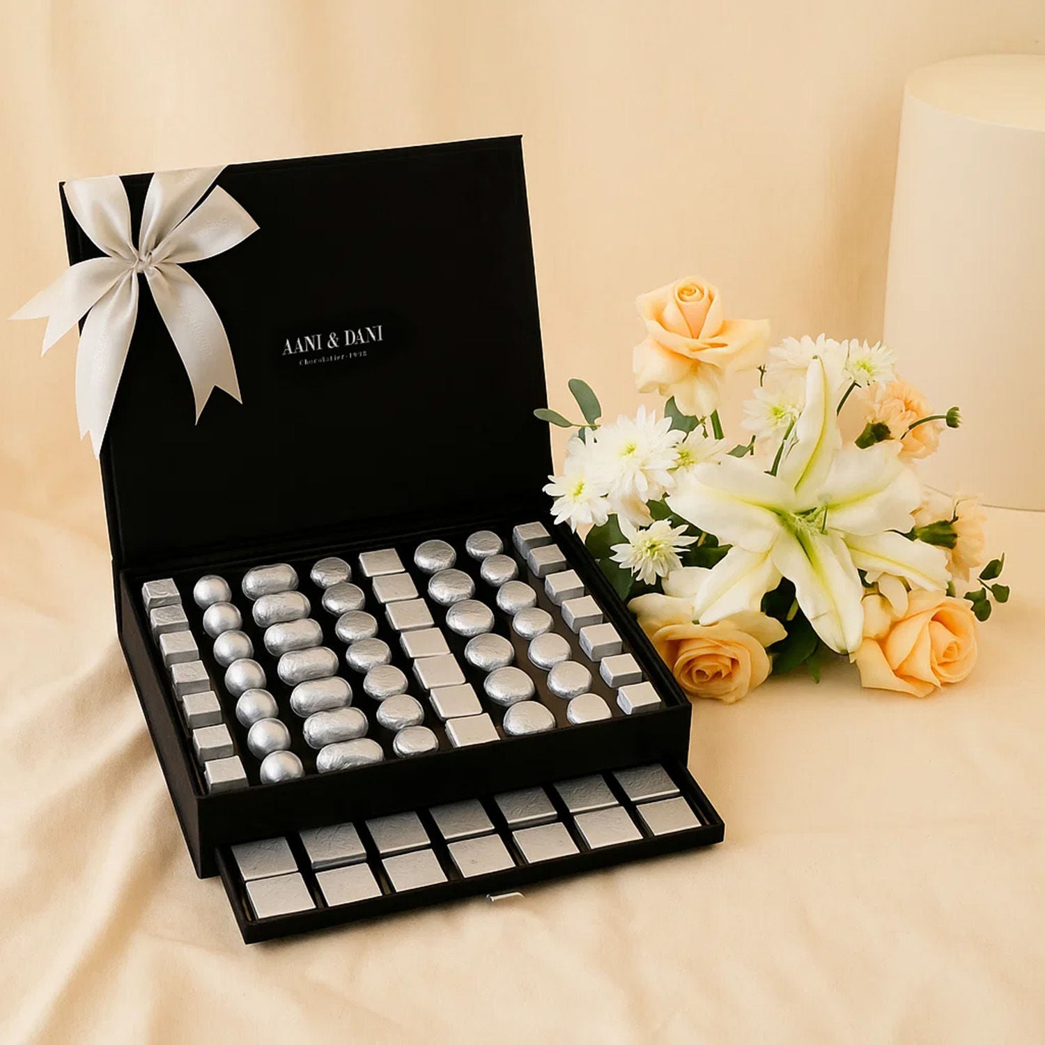 Buy AANI & DANI Chocolate With Lily n Roses Online in Saudi Arabia - FNP SA